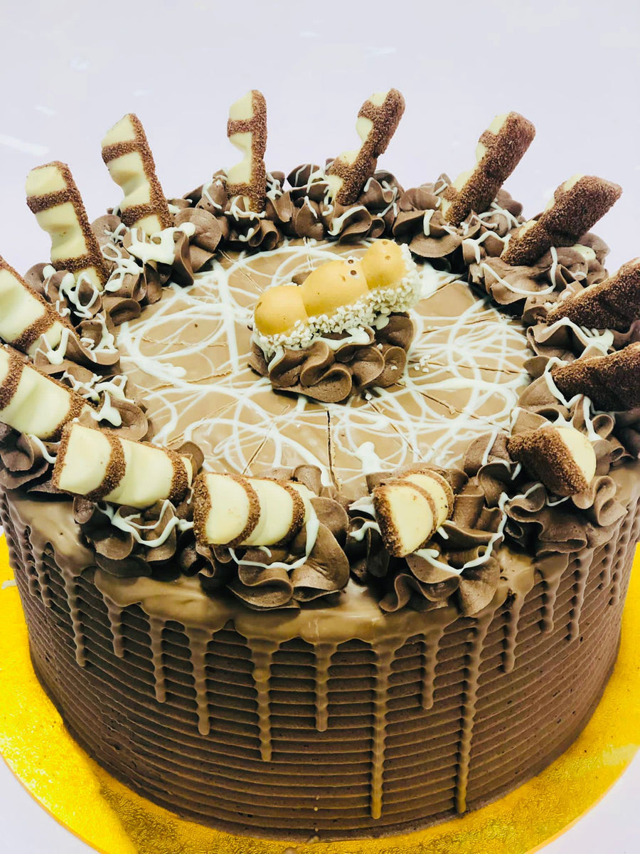 Kinder Bueno Chocolate Drip Cake – Zara Cakes